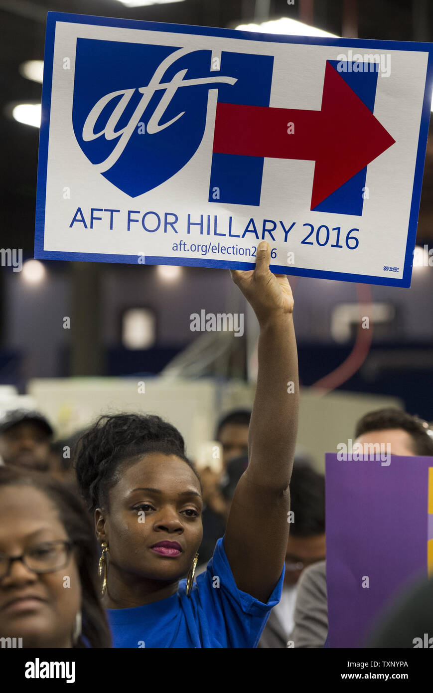 A supporter displays a sign for Hillary asDemocratic presidential ...