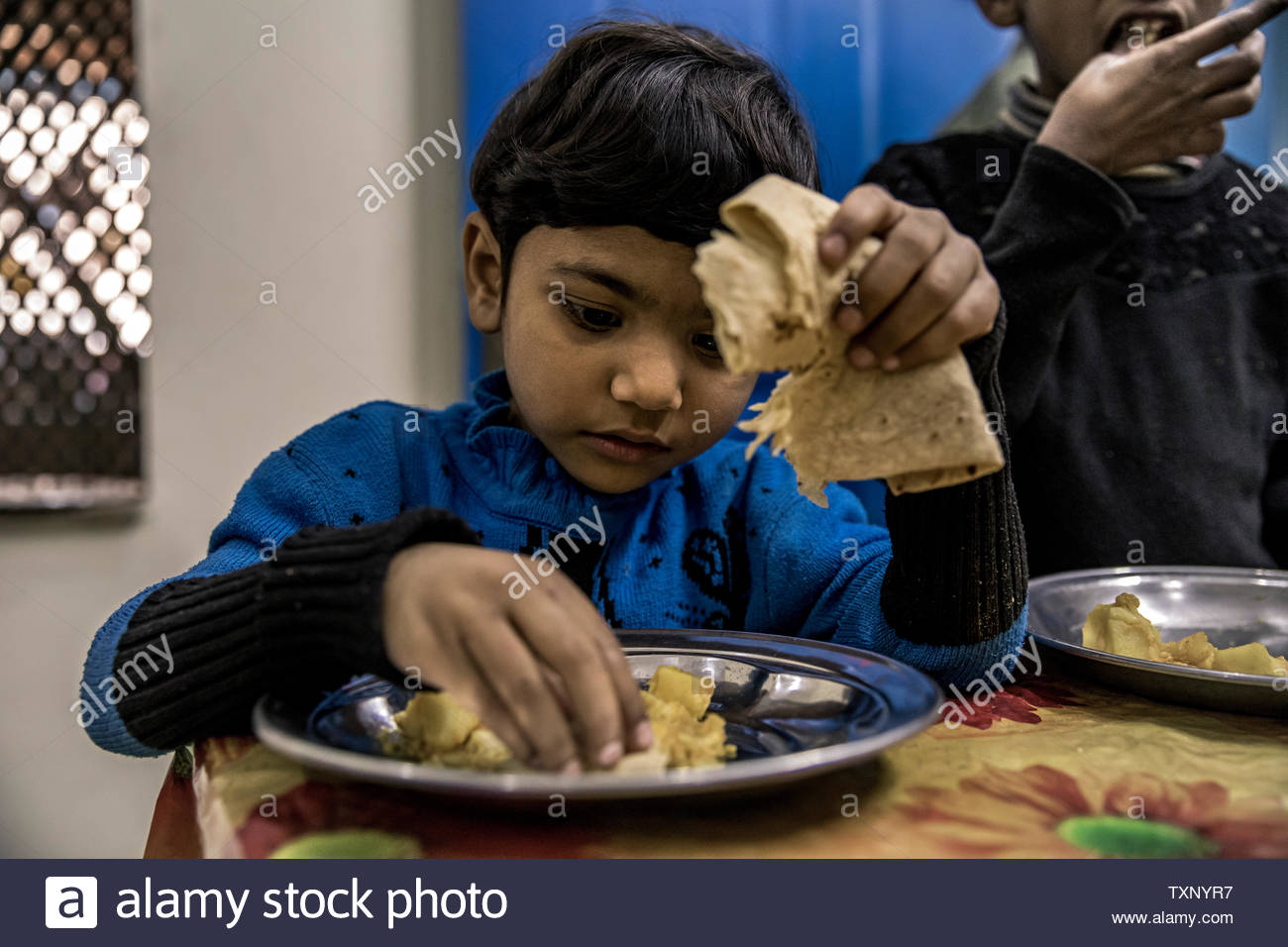 Orphanage Lunch High Resolution Stock Photography and Images - Alamy