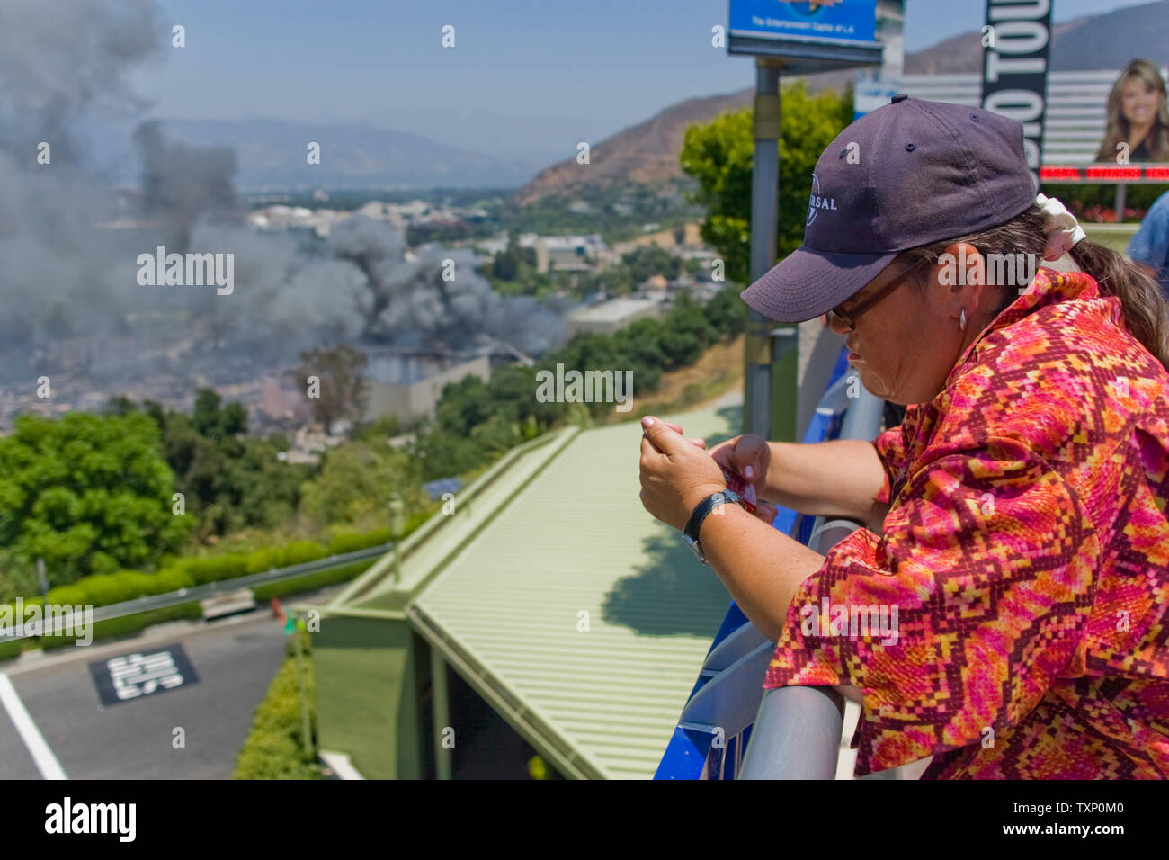 A female Universal Studios employee text messages her family while ...