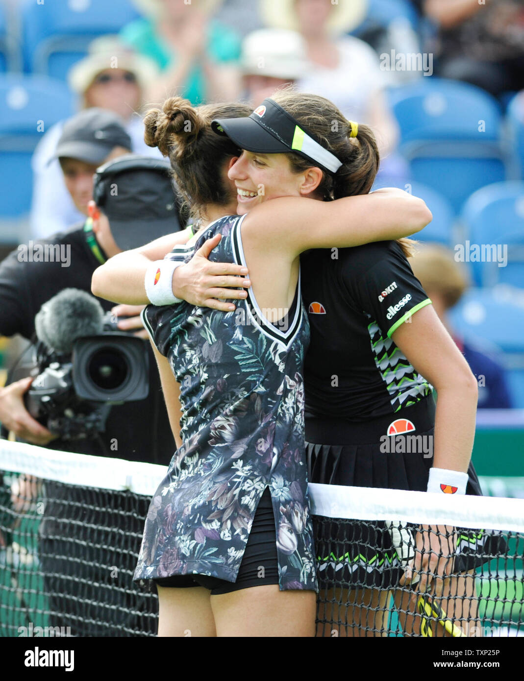 Eastbourne, UK. 25th June, 2019. Johanna Konta of Great Britain hugs ...