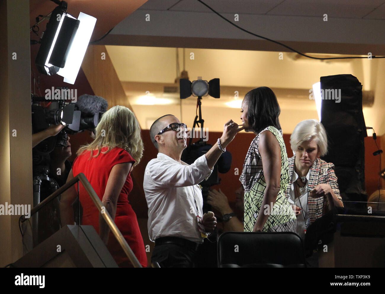 First Lady Michelle Obama prepares for an interview inside the Time ...