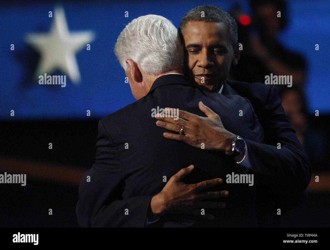 President Barack Obama hugs former President Bill Clinton after Clinton ...