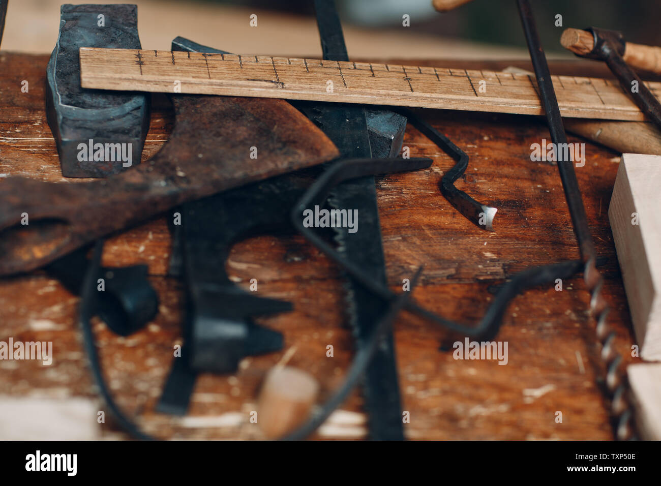 Tool carpenter on the table. Planer, ruler, hammer, drill, saw Stock ...