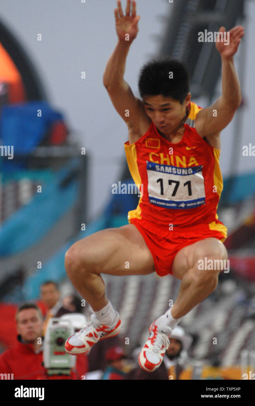 China's Yanxi wins the gold medal in the men's triple jump at the 15th ...