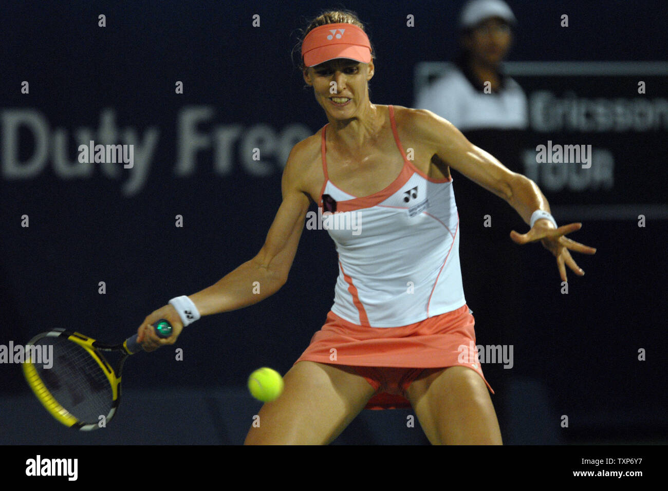 Elena Dementieva, from Russia returns the ball from her opponent, Ana ...