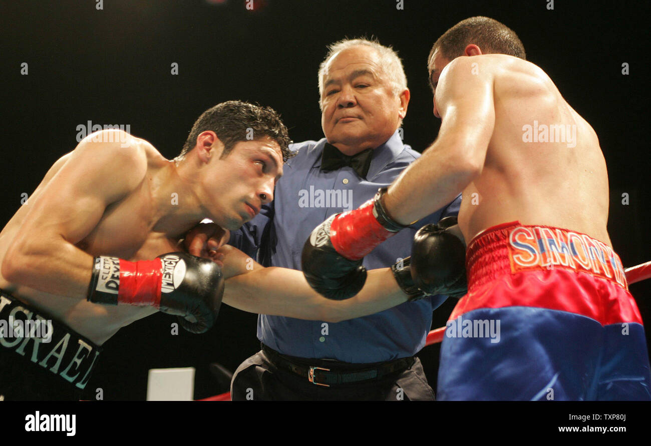 World Jr. Featherweight champion Israel Vazquez of Mexico City pounds ...