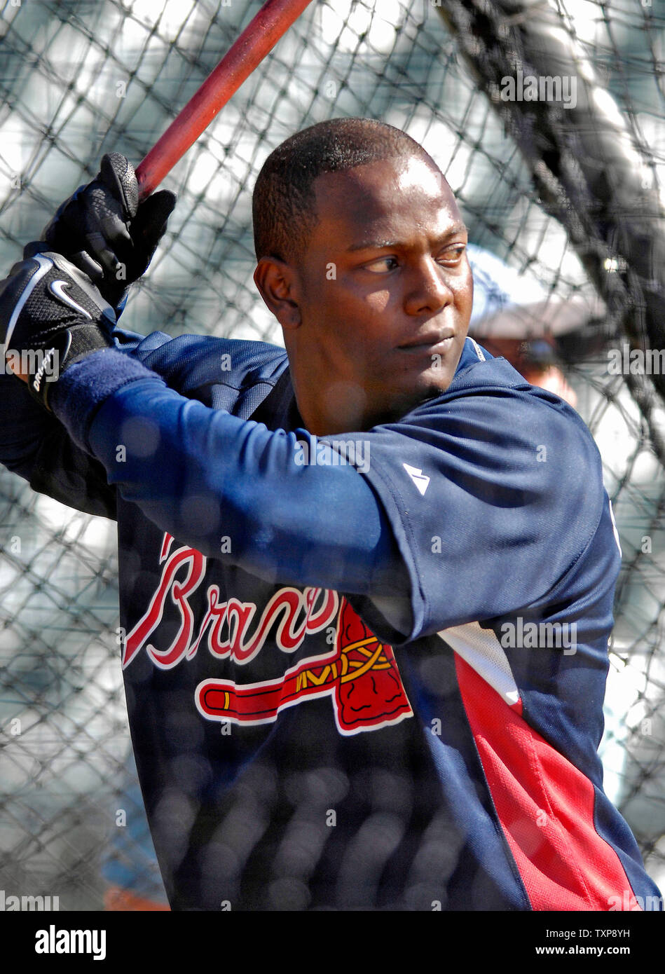 Atlanta Braves shortstop Edgar Renteria takes his turn in the batting ...
