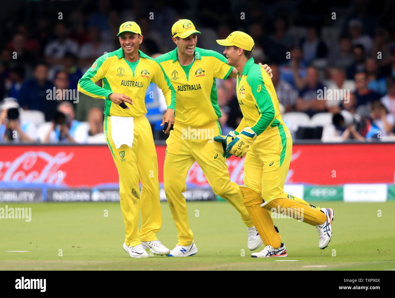 Australia's Usman Khawaja (left) celebrates catching out England's Jos ...
