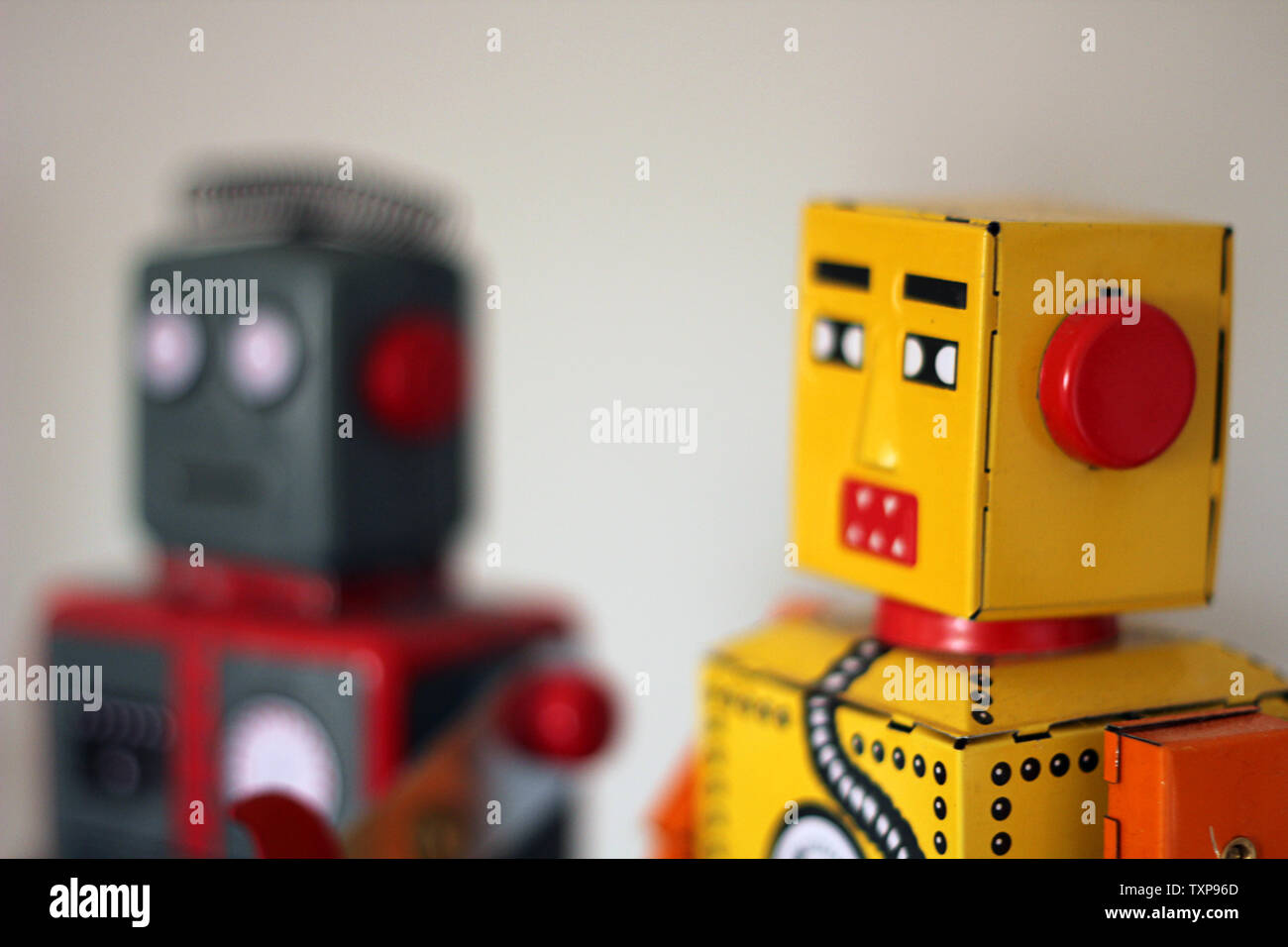 Two sheet metal robots in detail Stock Photo - Alamy