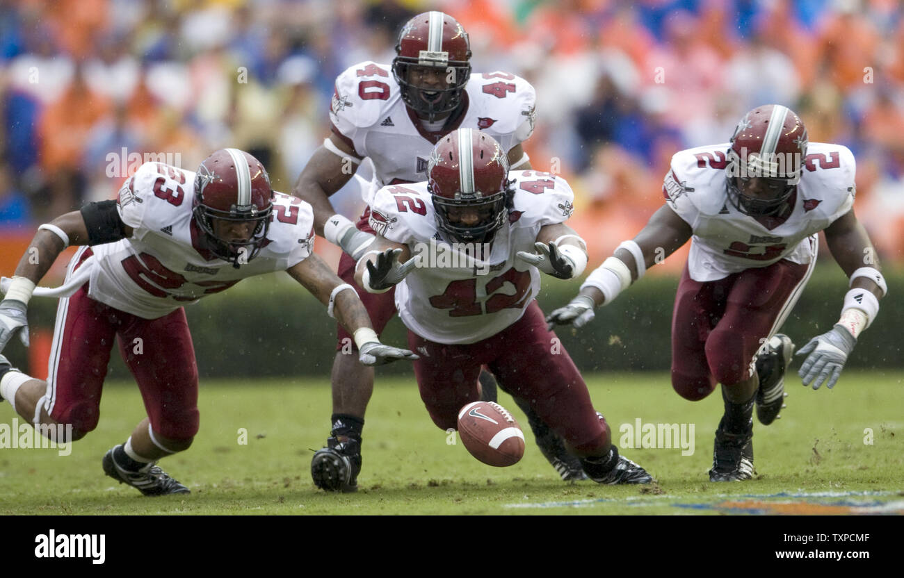 The Troy Trojan defense from left Bryant McKissic (23), David McDowell ...
