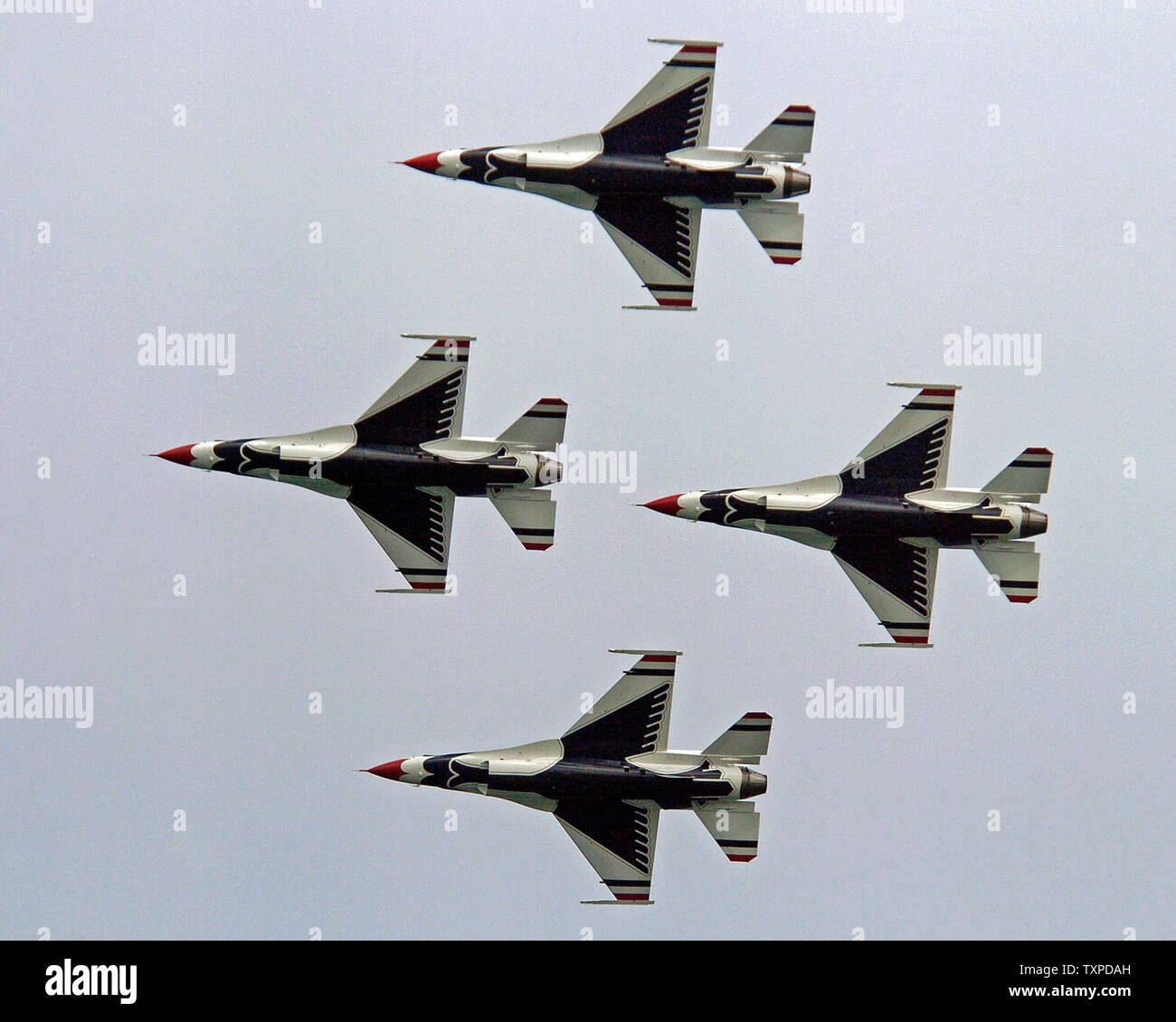 The USAF Air Demonstration Team, the "Thunderbirds" perform the four ...