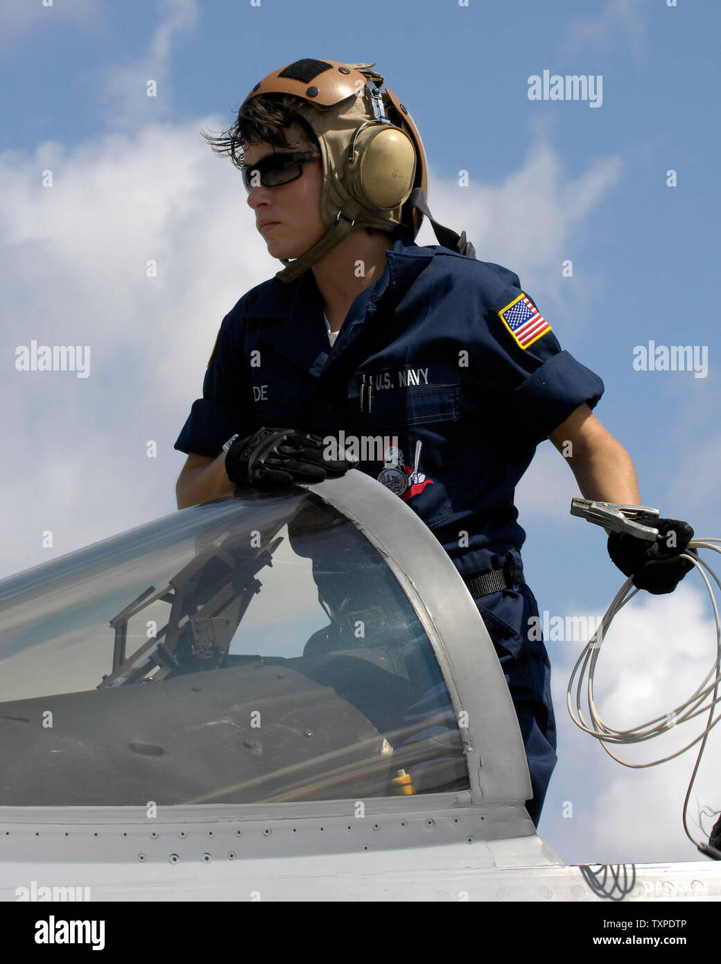Airman Alicia Rude of the US Navy Hornet Demonstration Team deplanes ...