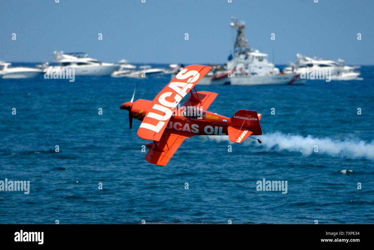 Michael Wiskus, flying his Lucas Oil Pitts Special, performs aerobatic ...
