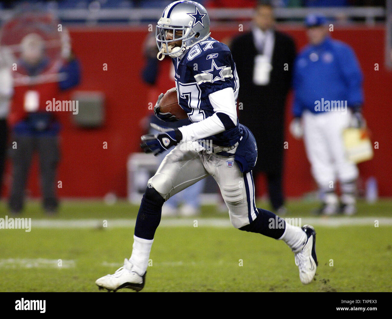 Wide receiver Zuriel Smith, of the Dallas Cowboys, runs a pass down ...