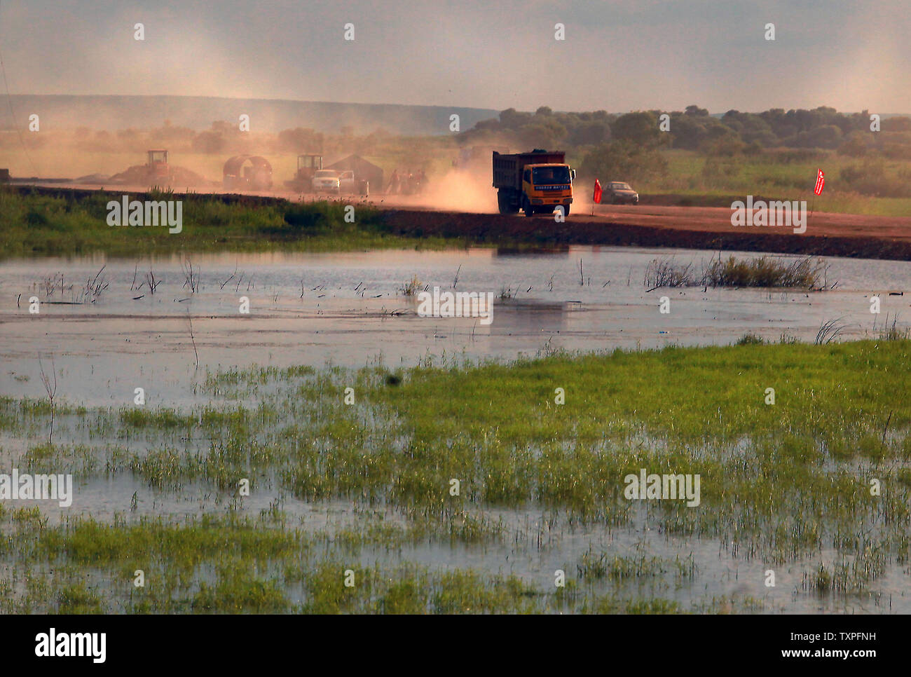 Road construction is underway alongside the massive Three Rivers Nature ...