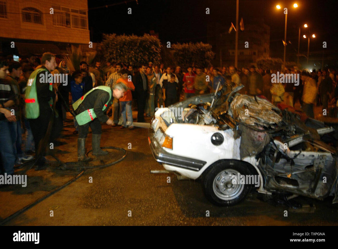 Palestinianssea searsh in the car of Hamas leader in Gaza Dr. Abdel ...