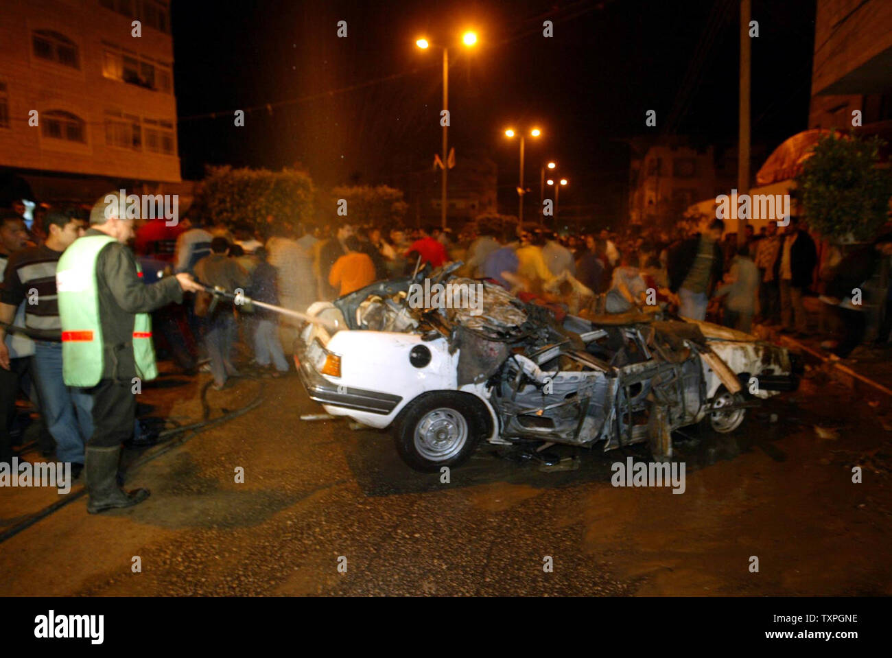 Palestinianssea searsh in the car of Hamas leader in Gaza Dr. Abdel ...