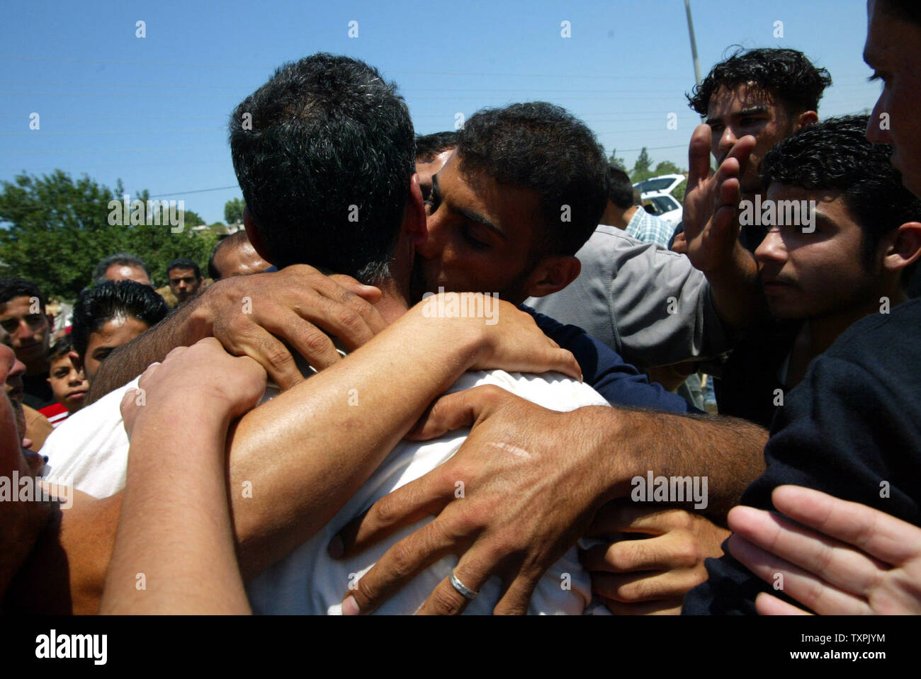 A freed Palestinian prisoner from an Israeli jail is reunited with his ...