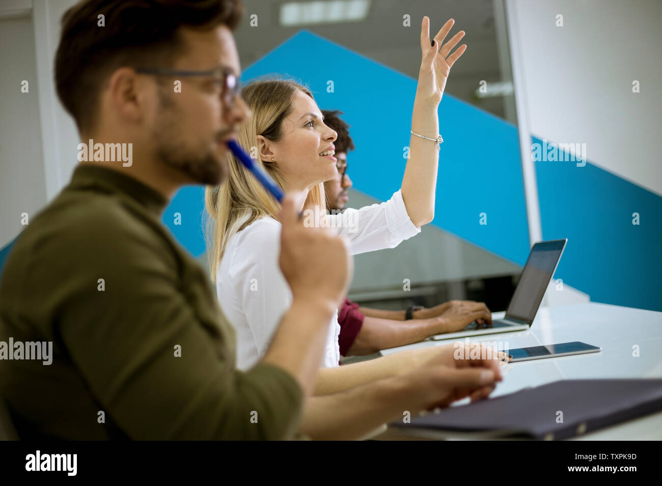 Woman raising hand question hi-res stock photography and images - Alamy