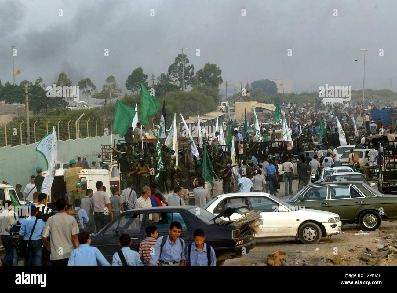 Jubilant Palestinians gather in Jewish settlements as Israeli troops ...