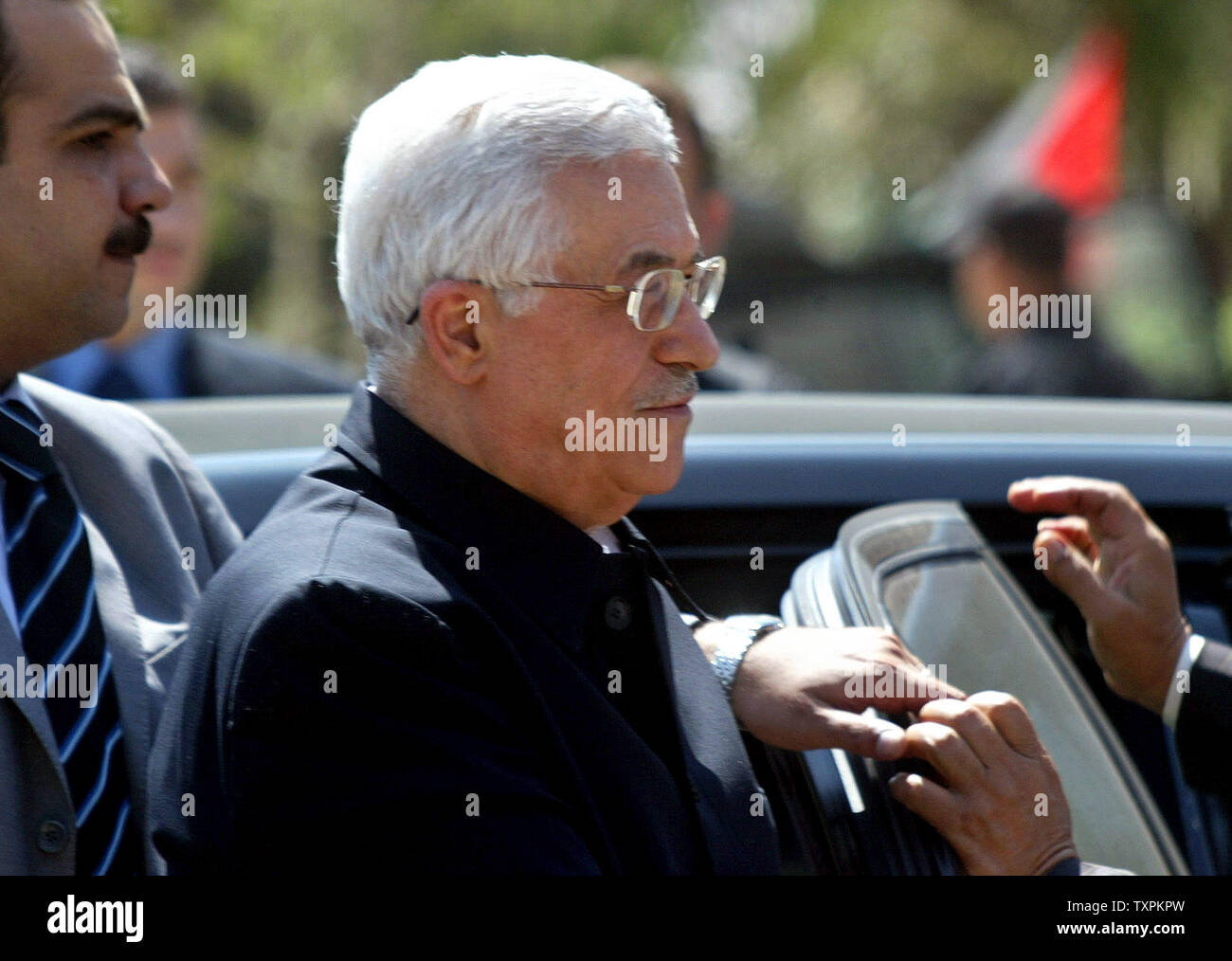 Palestinian President Mahmoud Abbas leaves the car during his visit to ...