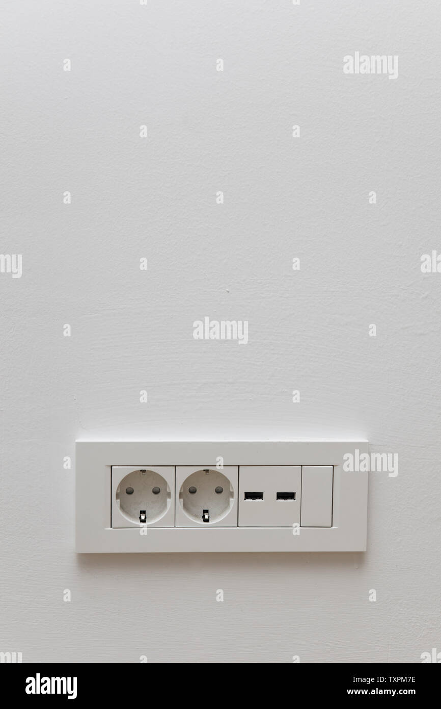 Wall in modern appartment with plugs for internet, network and ...