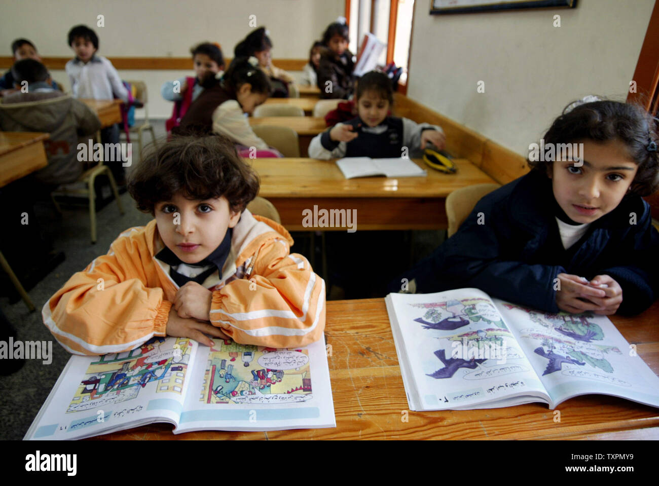 Palestinian school boys attend lessons at the Dar Al-Arqam of Hamas ...