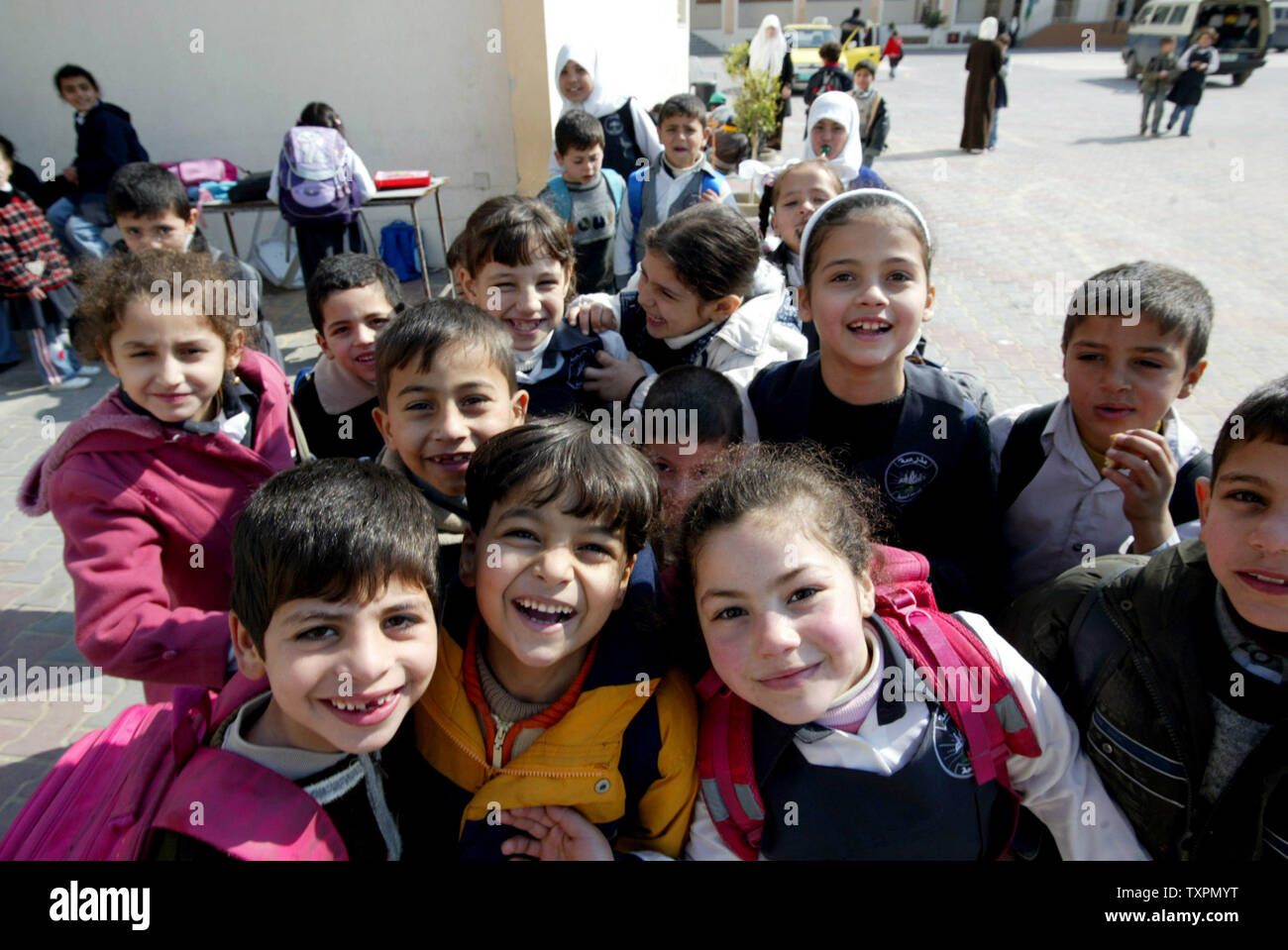 Palestinian school boys stands in the Dar Al-Arqam of Hamas Islamic ...