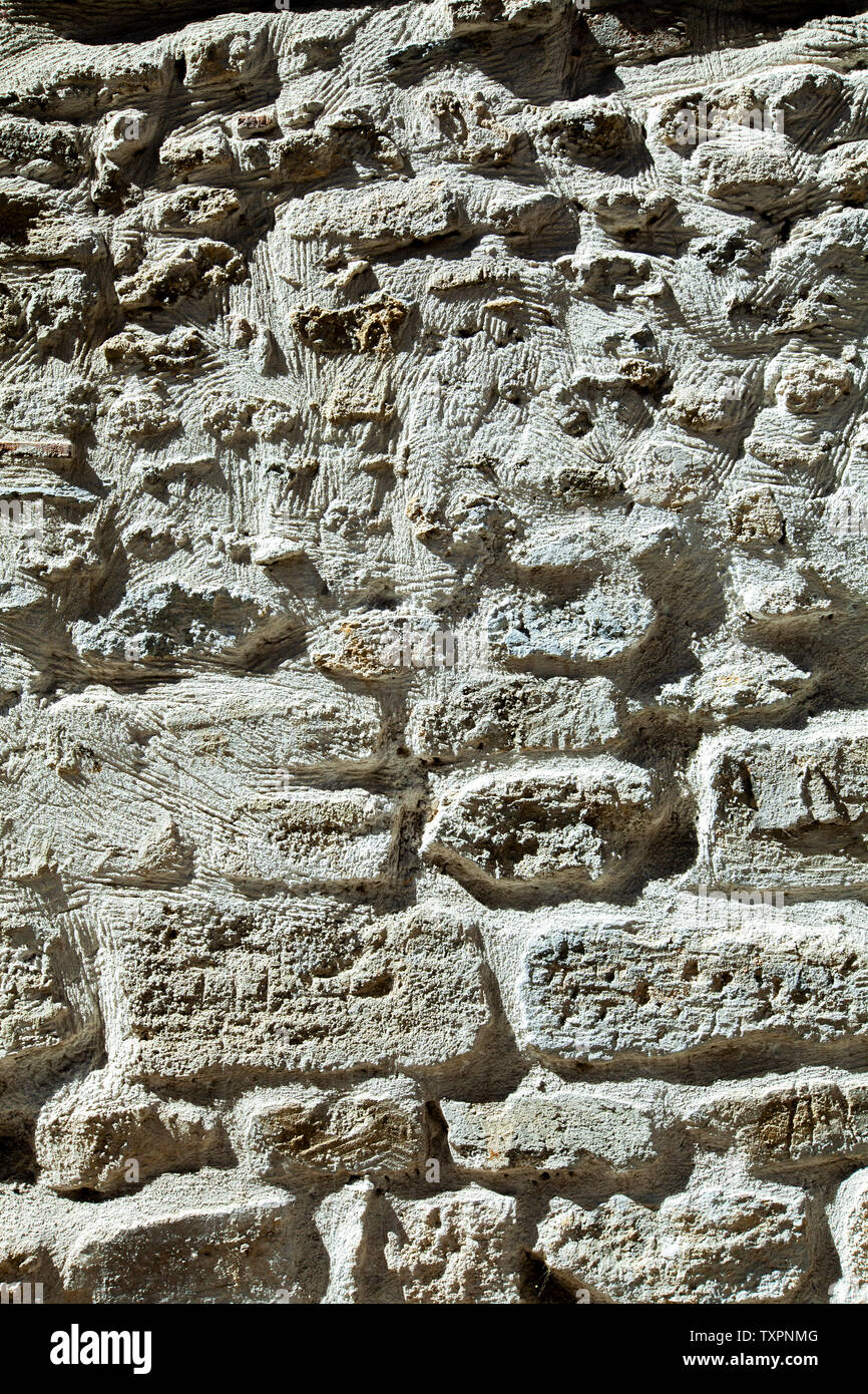 Detail of the white stone wall background texture Stock Photo - Alamy