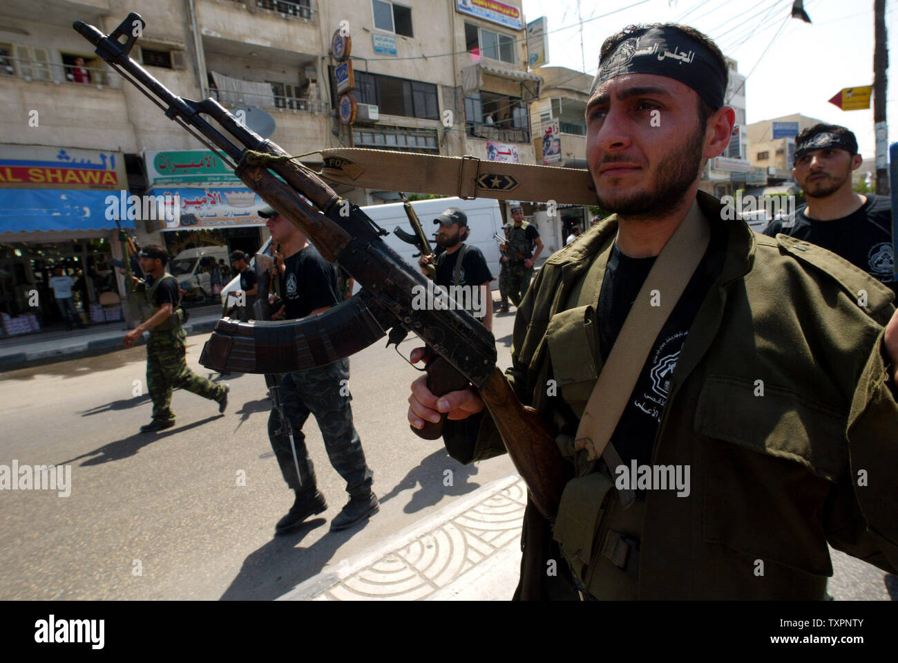 Militants from the Al-Aqsa Martyr's Brigade, a group linked to ...