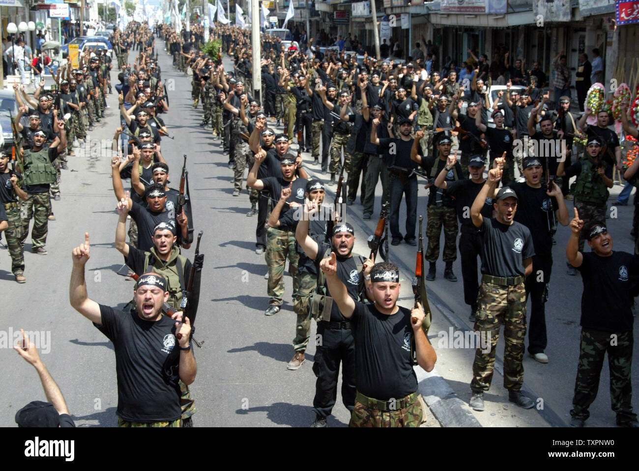 Militants from the Al-Aqsa Martyr's Brigade, a group linked to ...