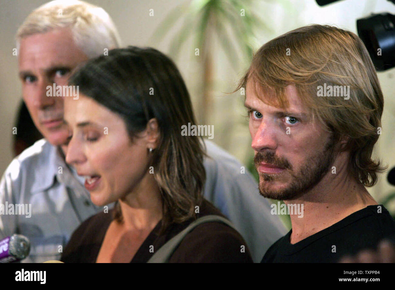 Fox News journalists Olaf Wiig, 36, from New Zealand (R), standS with ...