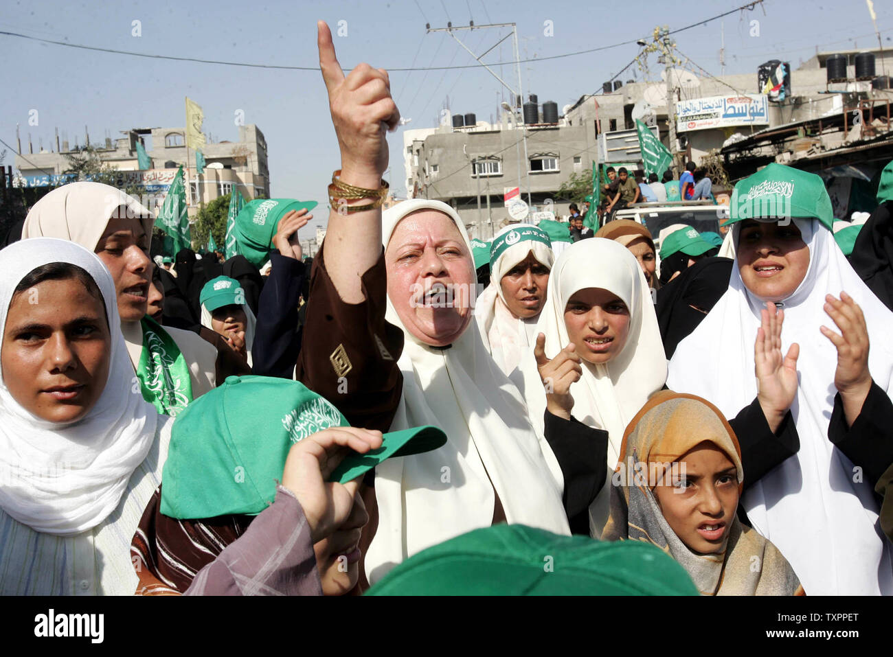 Palestinian supporters of the Islamic Resistance Movement Hamas march ...