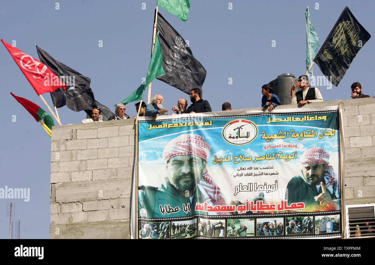 Catholic activists Father Peter Dougherty (4th L) and sister Mary ...