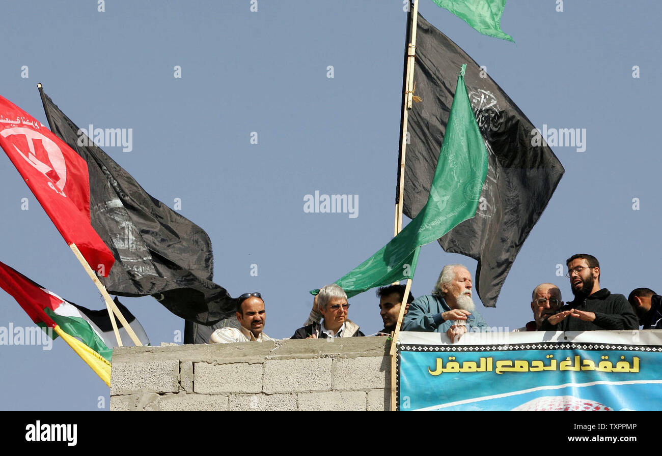 Catholic activists Father Peter Dougherty (4th L) and sister Mary ...