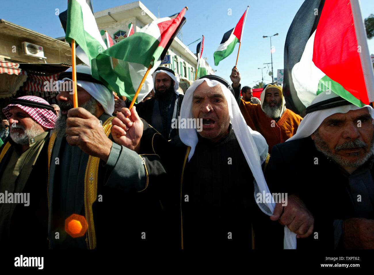 In a protest organized by Hamas, thousands of Palestinians demonstrate ...