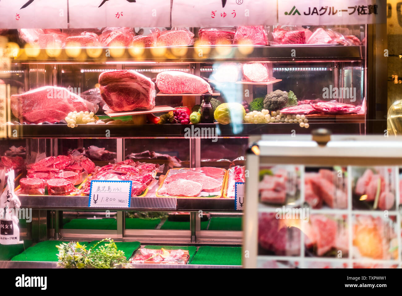 Osaka, Japan - April 13, 2019: Minami Namba famous street with butcher ...
