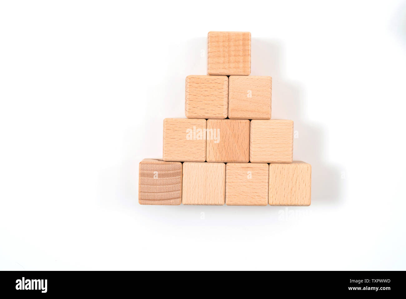 wood cube arrange in pyramid shape ,business concept Stock Photo - Alamy