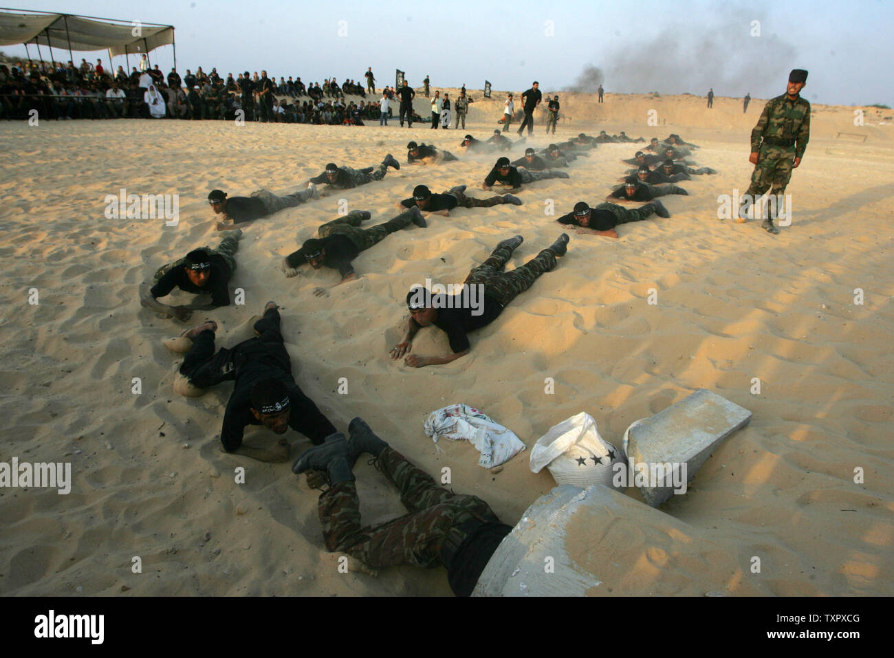 Members of the Palestinian Popular Resistance Committees are seen ...