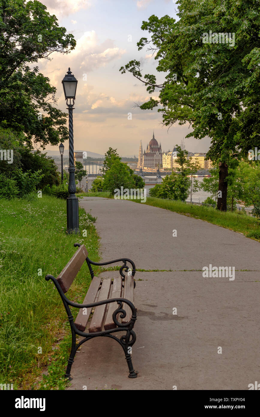 A bench in a park in Budapest overlooking the Hungarian Parliament ...