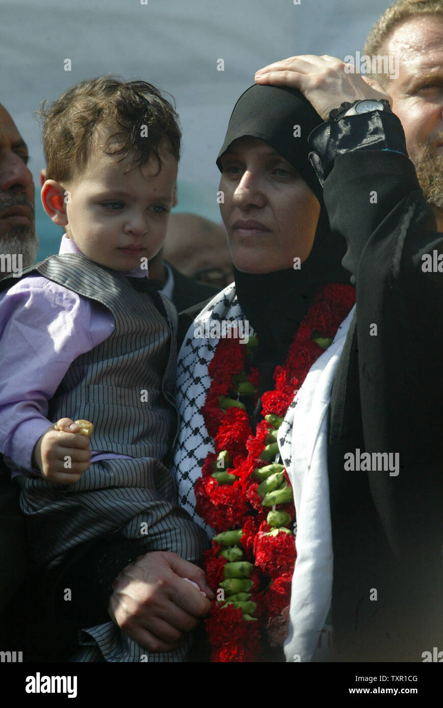 Newly-freed Palestinian prisoner Fatima Yunes al-Zaq and her son Yussef ...
