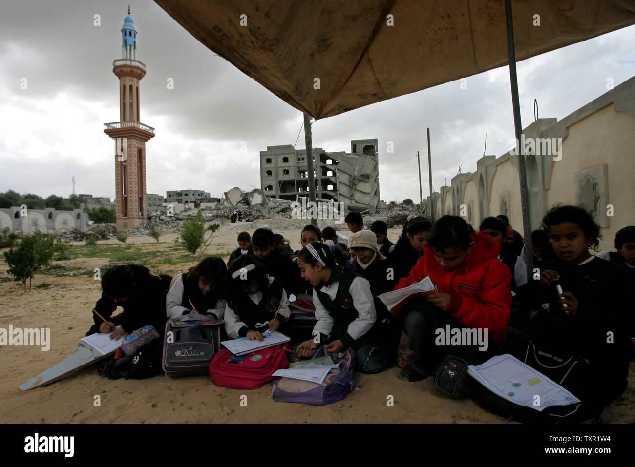 Palestinian school children study in a tent used as a classroom since ...