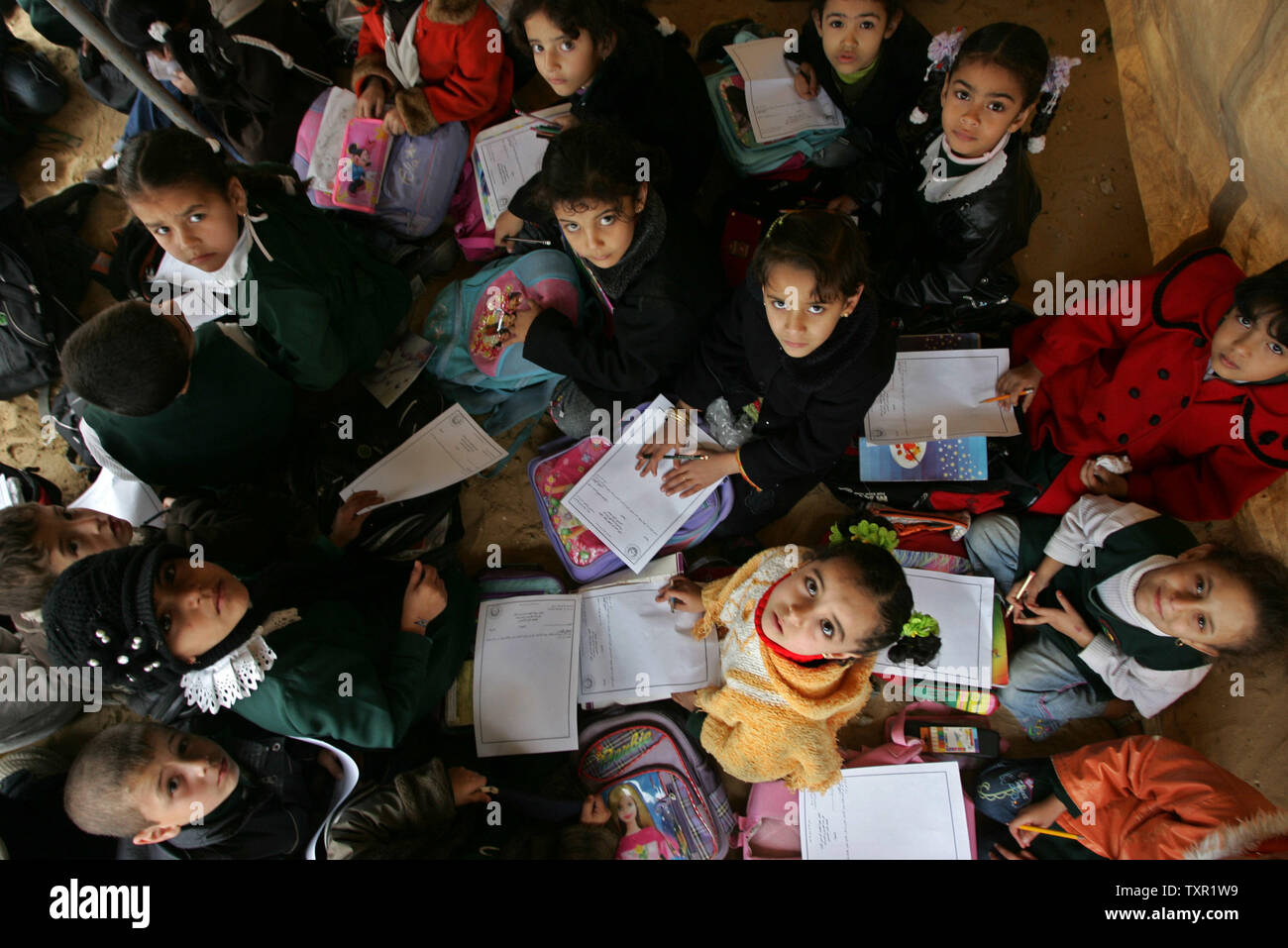Palestinian school children study in a tent used as a classroom since ...