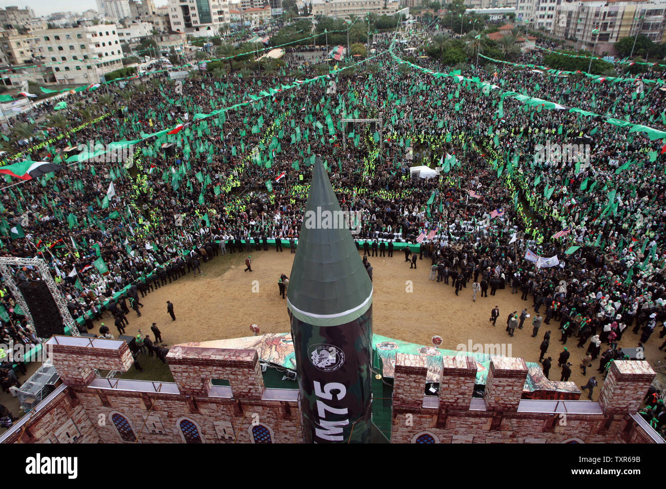 A large model of a M75 long range rocket is seen as thousands of Hamas ...