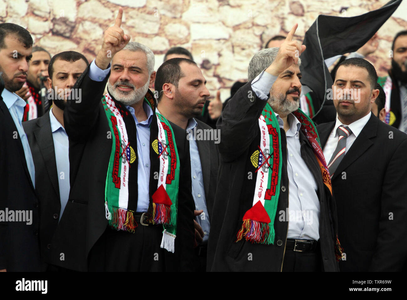 Hamas chief Khaled Mashaal,(2-R), and Hamas and Prime Minister Ismail ...