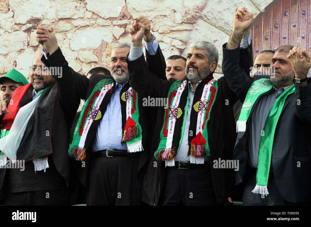 Hamas chief Khaled Mashaal,(2-R) and Hamas and Prime Minister Ismail ...