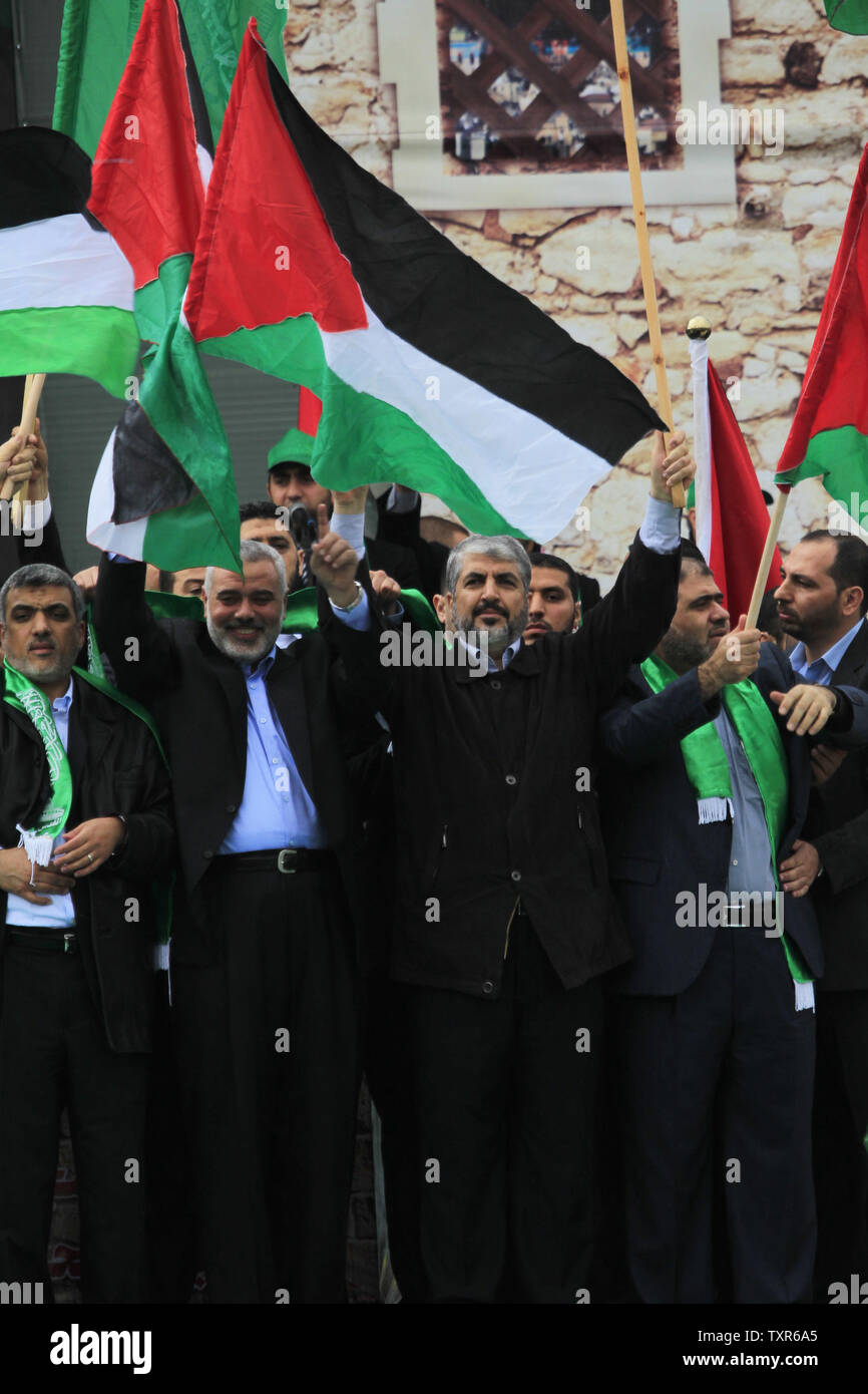 Hamas chief Khaled Mashaal,(2-R), and Hamas and Prime Minister Ismail ...