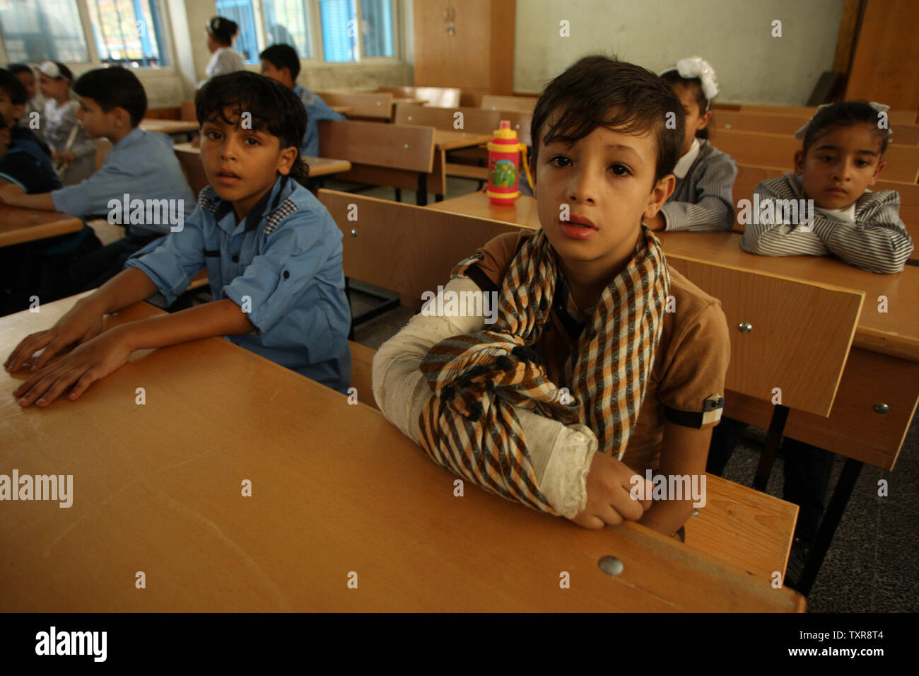 Wounded by Israeli shelling, Palestinian student Nidal Ahmed Musa, age ...