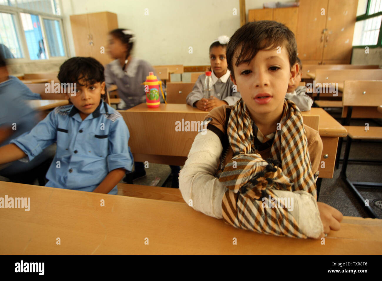 Wounded by Israeli shelling, Palestinian student Nidal Ahmed Musa, age ...