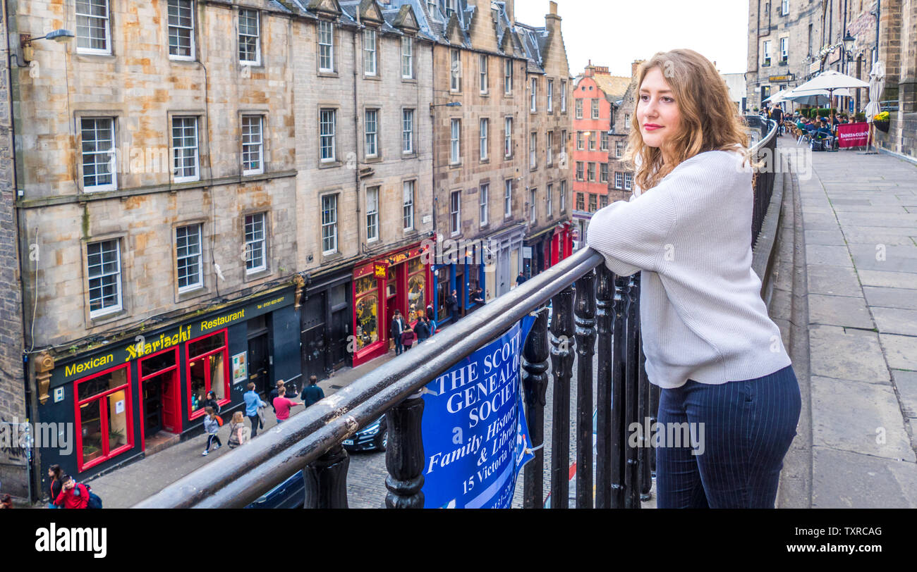 Pretty young woman on the higher level of Victoria Terrace overlooking ...